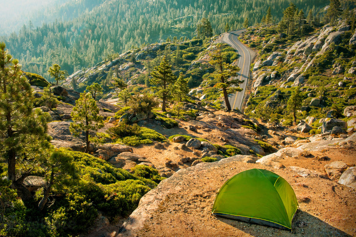Tent Pitched on a Ledge with Stock Photo - PixelTote