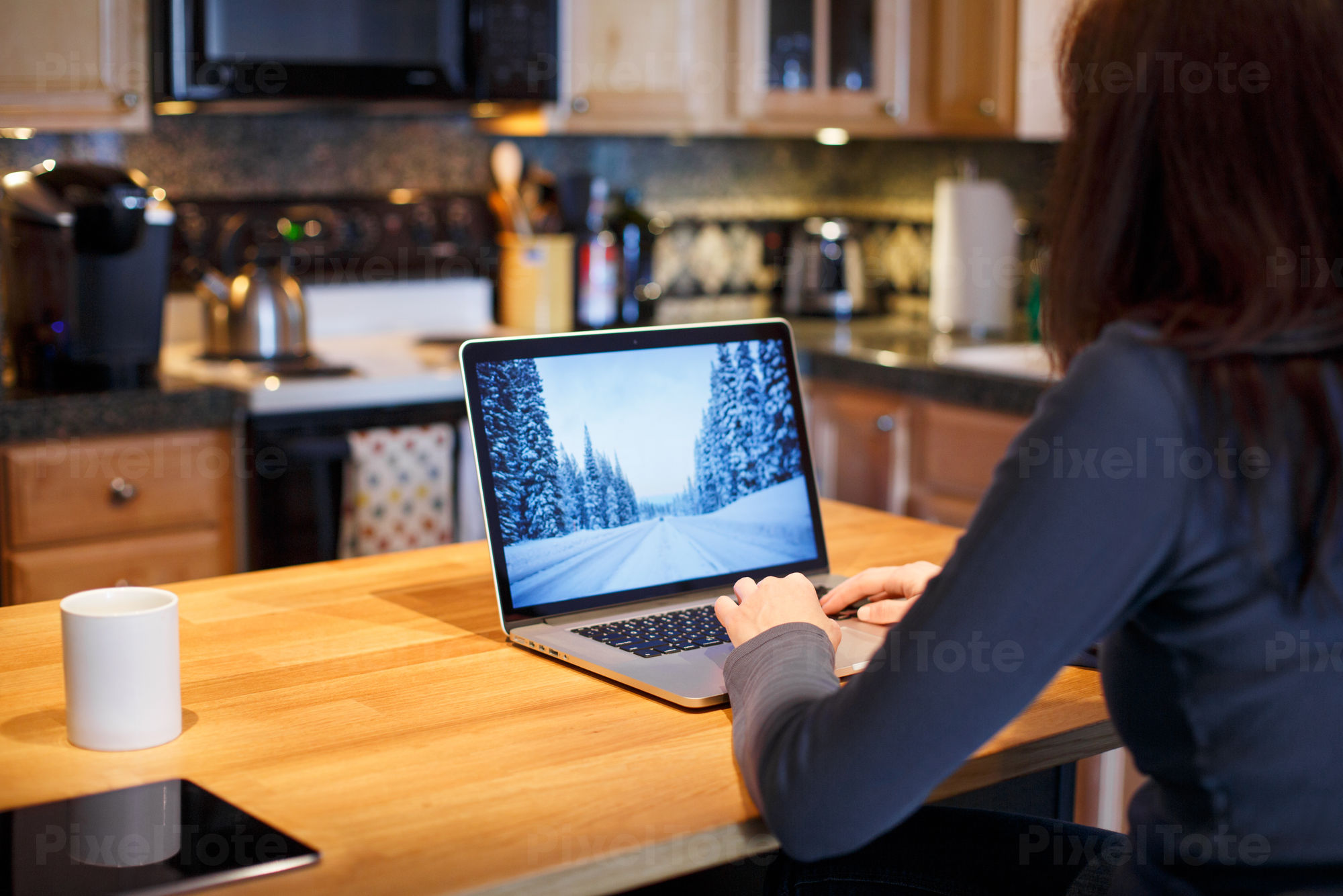 Woman Remotely Working from Home Stock Photo - PixelTote