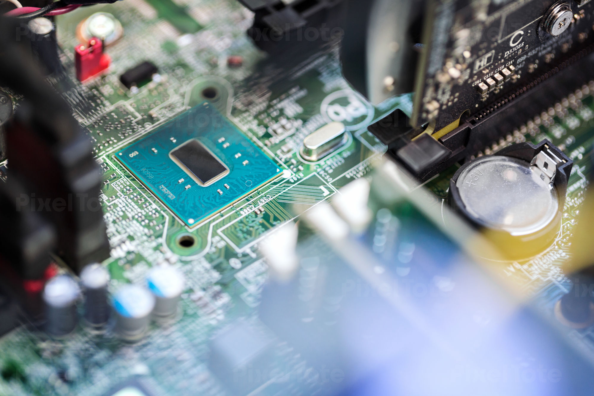 Detailed View of a PCB with a Stock Photo - PixelTote