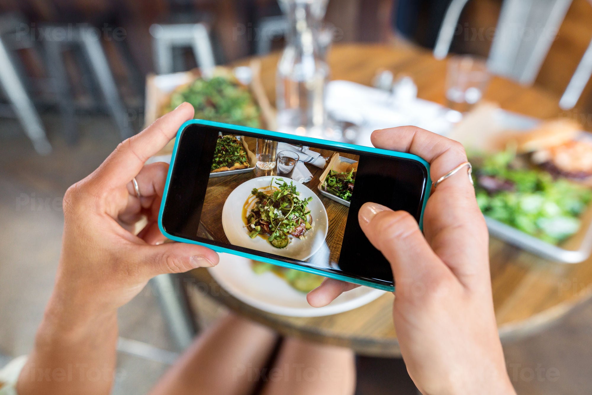 Hands of a Woman Taking a Picture of a Meal with a Cell Phone Stock ...