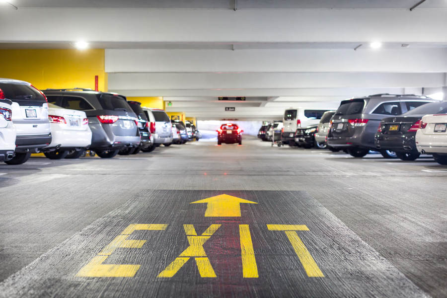 Exit Sign at a Parking Garage Stock Photo - PixelTote