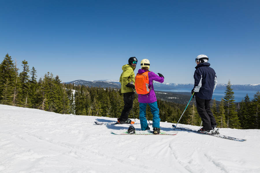 Skiers and a Snowboarder at a Stock Photo - PixelTote