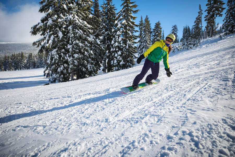 Snowboarder on the Toe Side Slicing Stock Photo - PixelTote